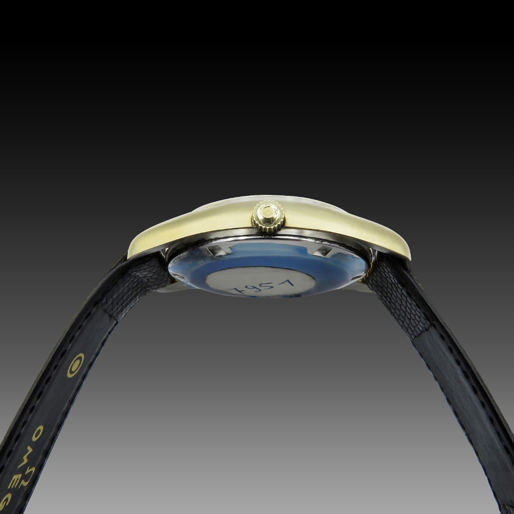 Montre Omega Seamaster MÃ©tal dorÃ© de 1961. Stock neuf. 35 mm.