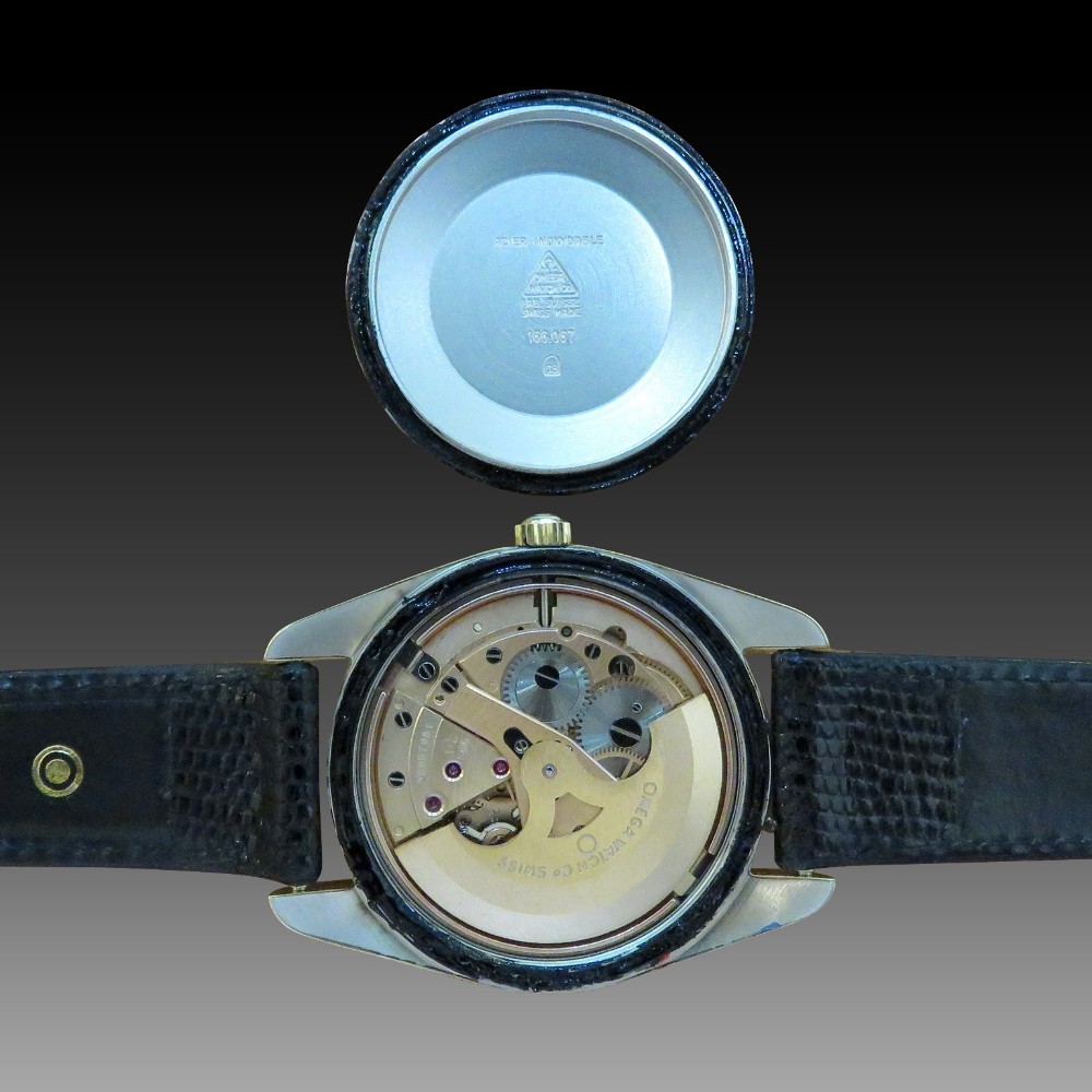 Montre Omega Seamaster MÃ©tal dorÃ© de 1961. Stock neuf. 35 mm.